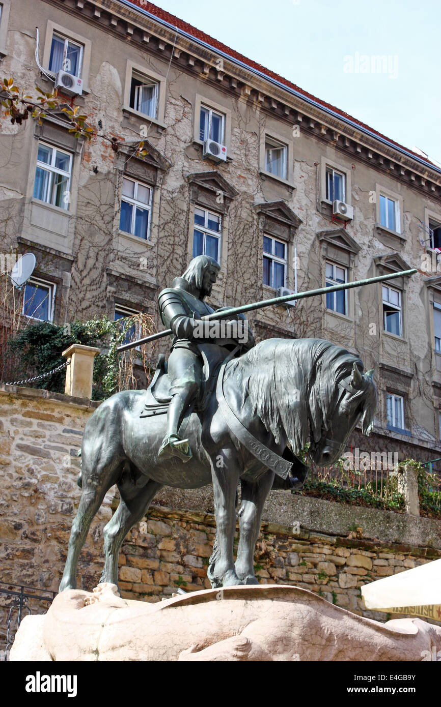 St. George after the battle with the Dragon, sculpture Stock Photo - Alamy