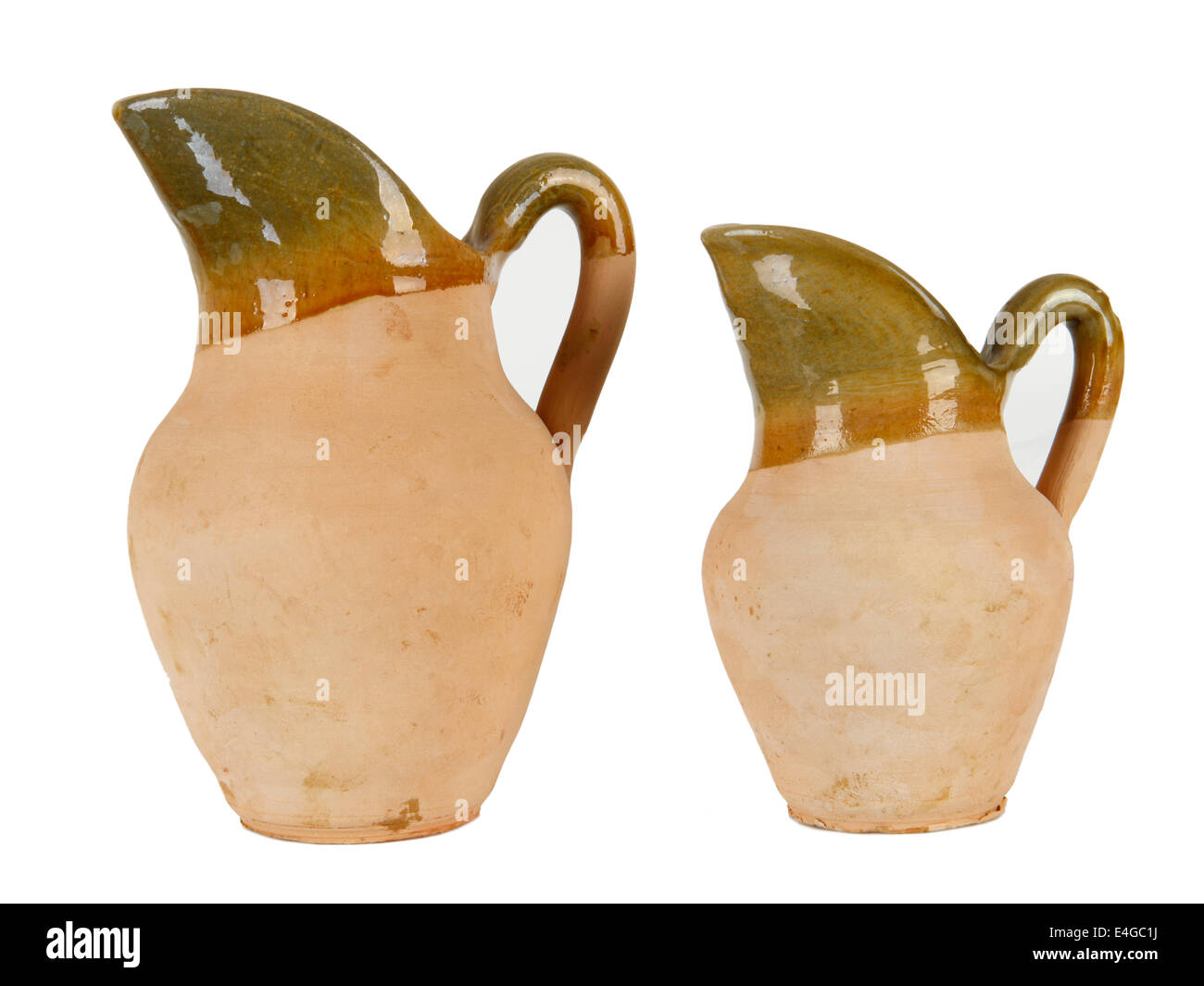 Two clay jugs isolated on white background Stock Photo - Alamy