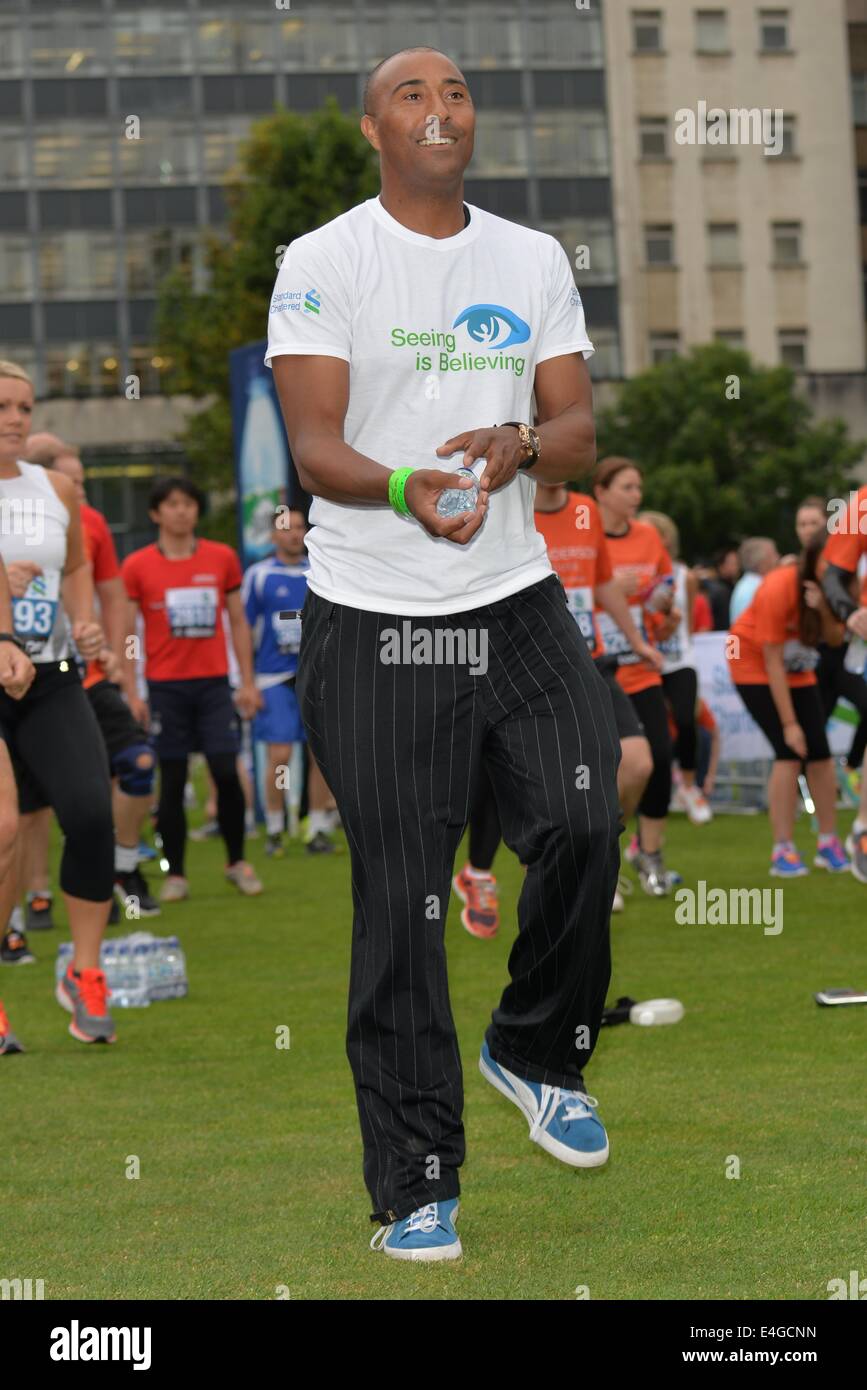 London, UK. 10th July, 2014. Colin Jackson warm up before the race at ...