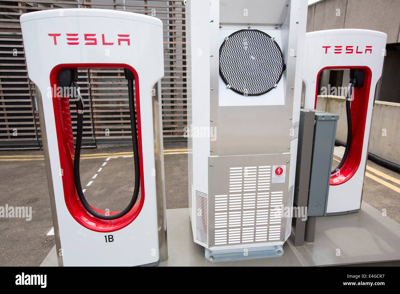 A Tesla electric vehicle recharging station at the Crystal building ...