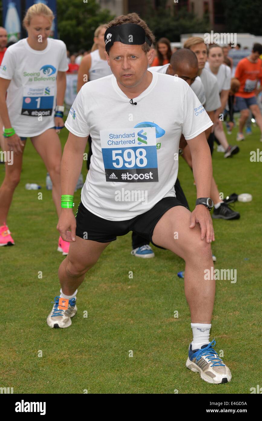 London, UK. 10th July, 2014. Paula Radcliffe and Mike Bushell warm up ...