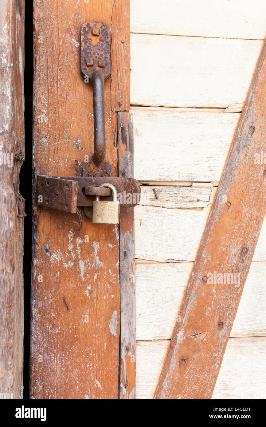 Old padlock on door hi-res stock photography and images - Alamy