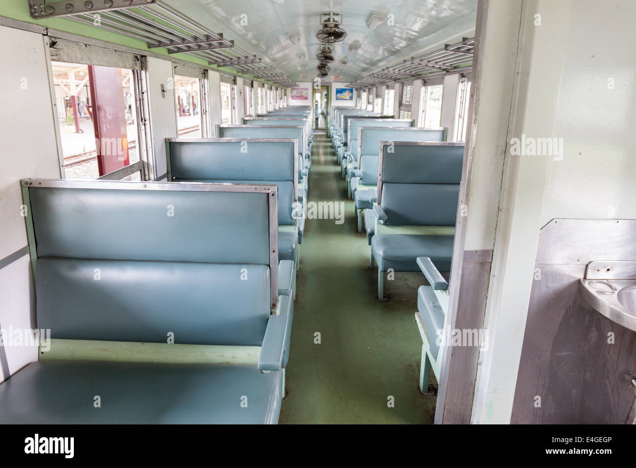 Vintage train interior with wooden seats Stock Photo - Alamy