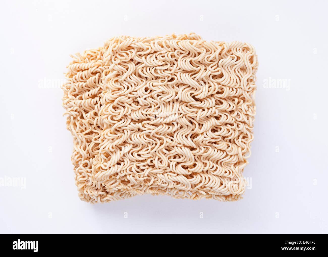 Instant asian style dried noodles in top view isolated on white ...