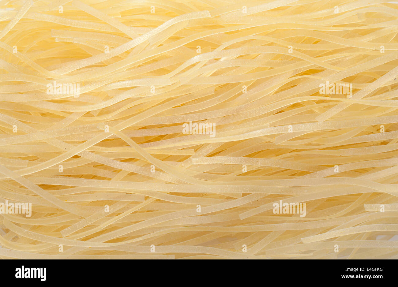Asian instant dried noodle sticks arranges as background Stock Photo ...