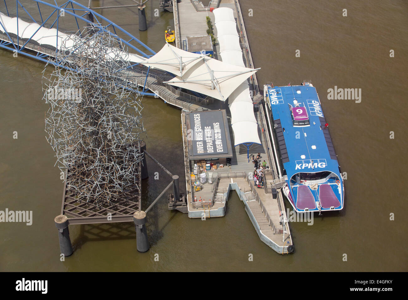 A steel sculpture and pontoon with a river boat cruise on the Thames by ...