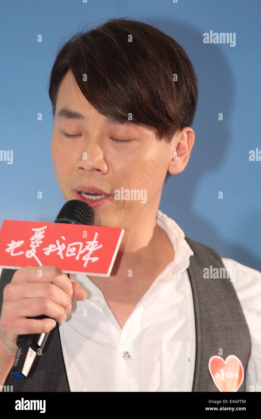 Taipei. 8th July, 2014. Singer David Tao attends a commonweal activity ...