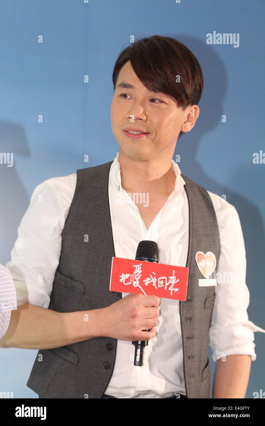 Taipei. 8th July, 2014. Singer David Tao attends a commonweal activity ...