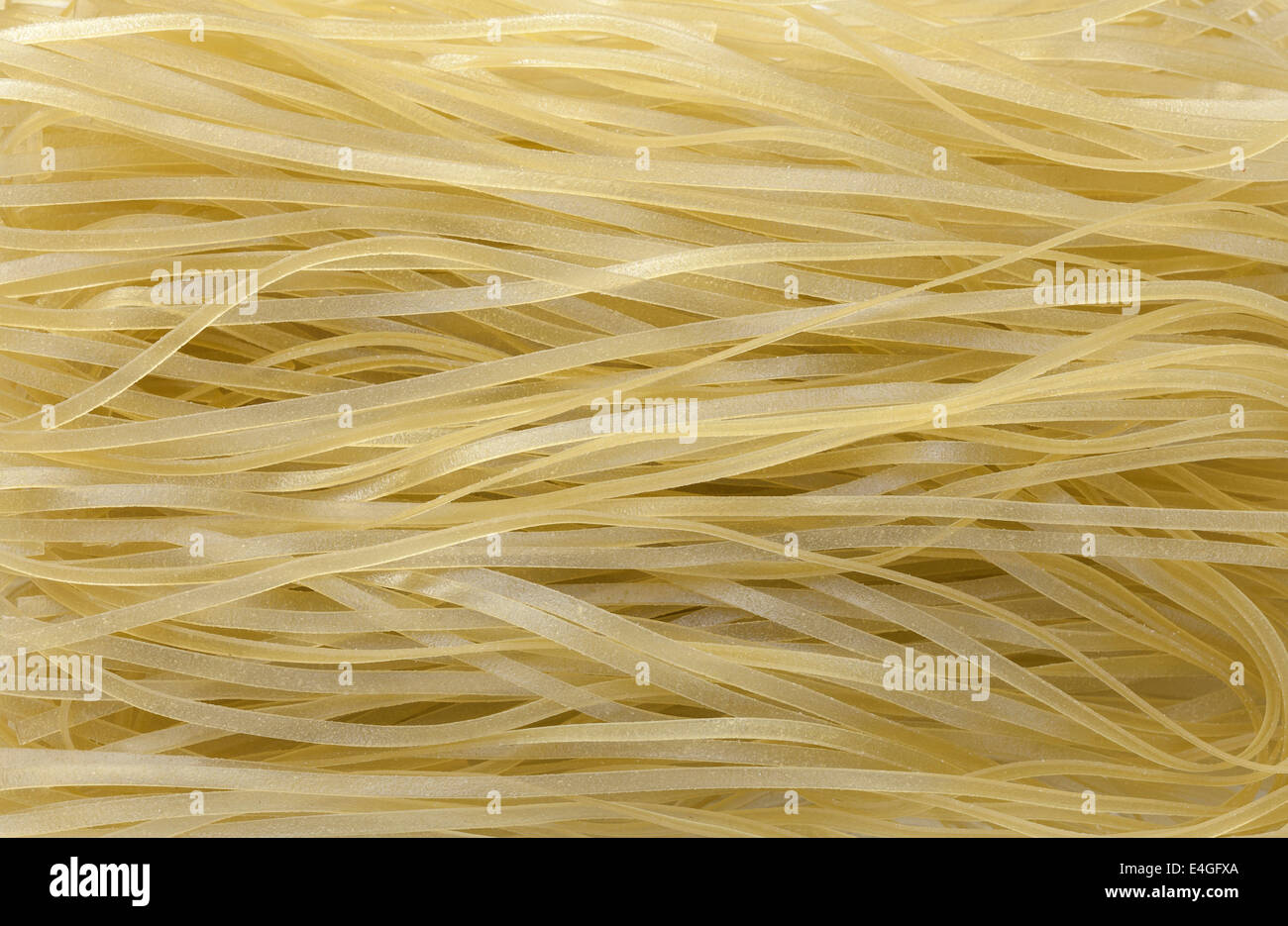 Asian instant dried noodle sticks arranges as background Stock Photo ...