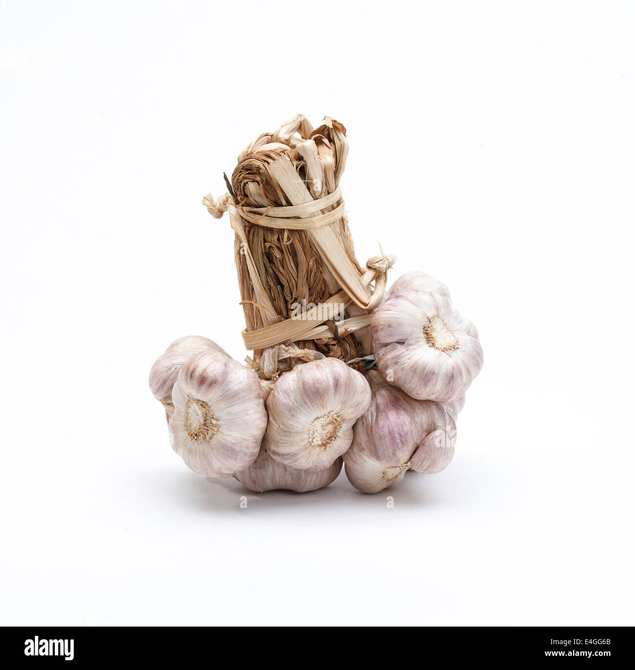 A bunch of garlic isolated on white background Stock Photo - Alamy