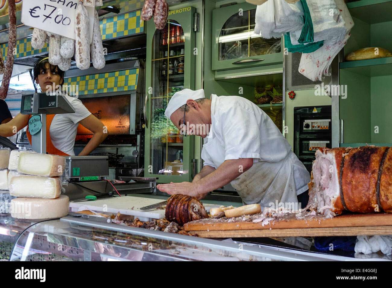 Food stand with the Porchetta pork specialty, weekly market, Siena ...