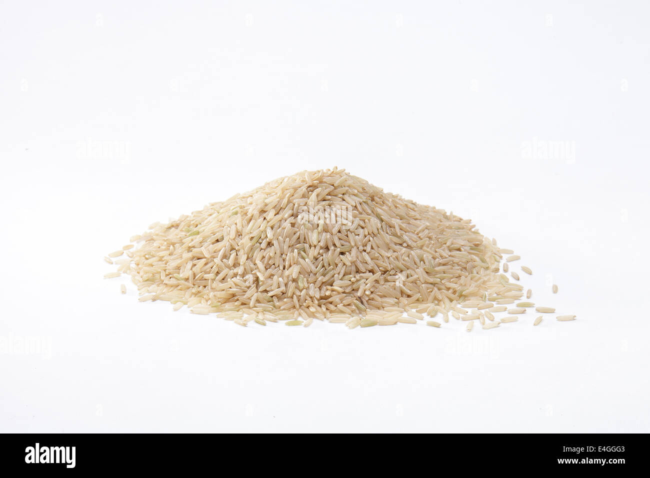 Heap of Thai brown rice isolated on white background Stock Photo - Alamy