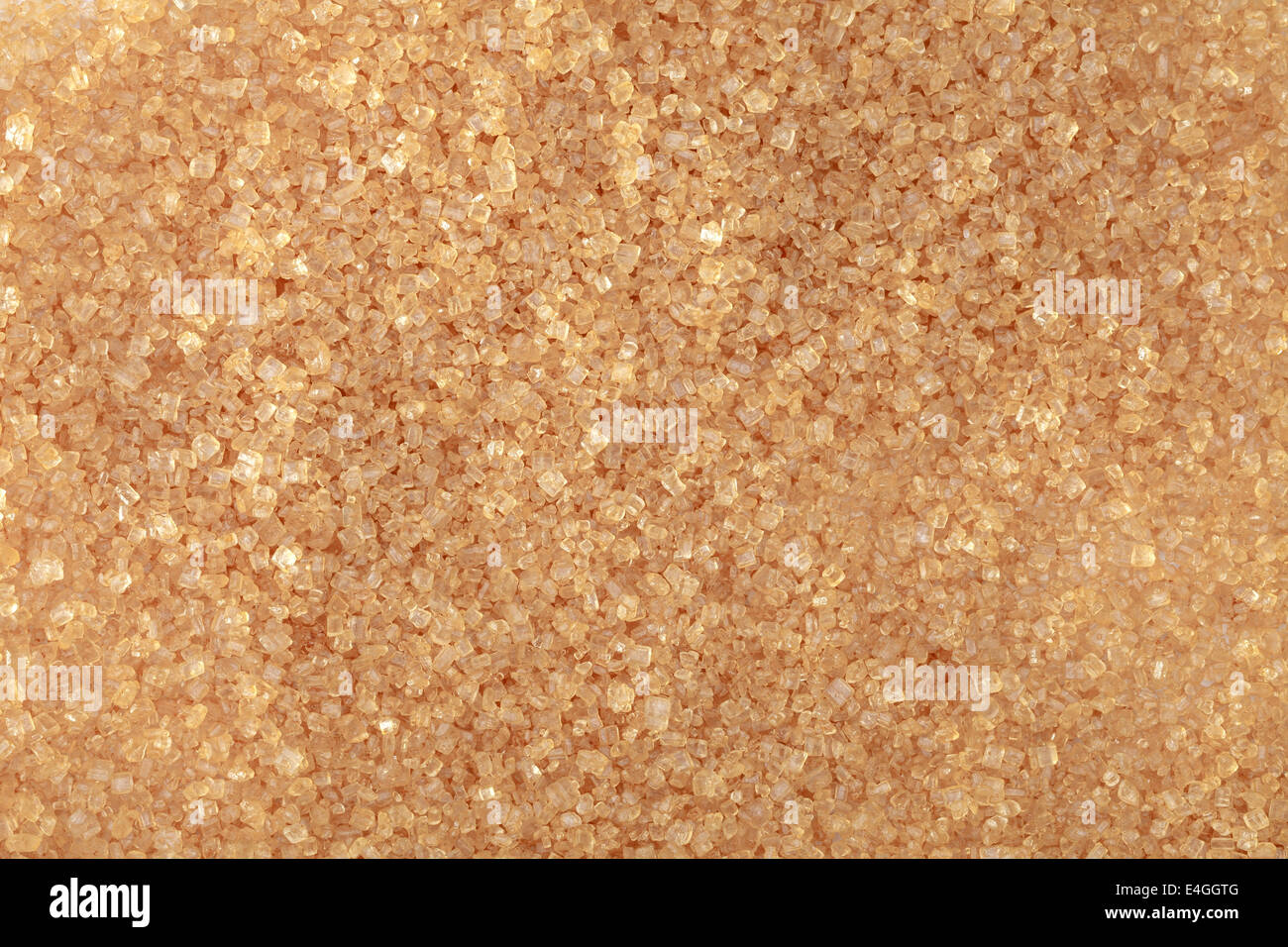 Brown sugar texture spread as background Stock Photo - Alamy