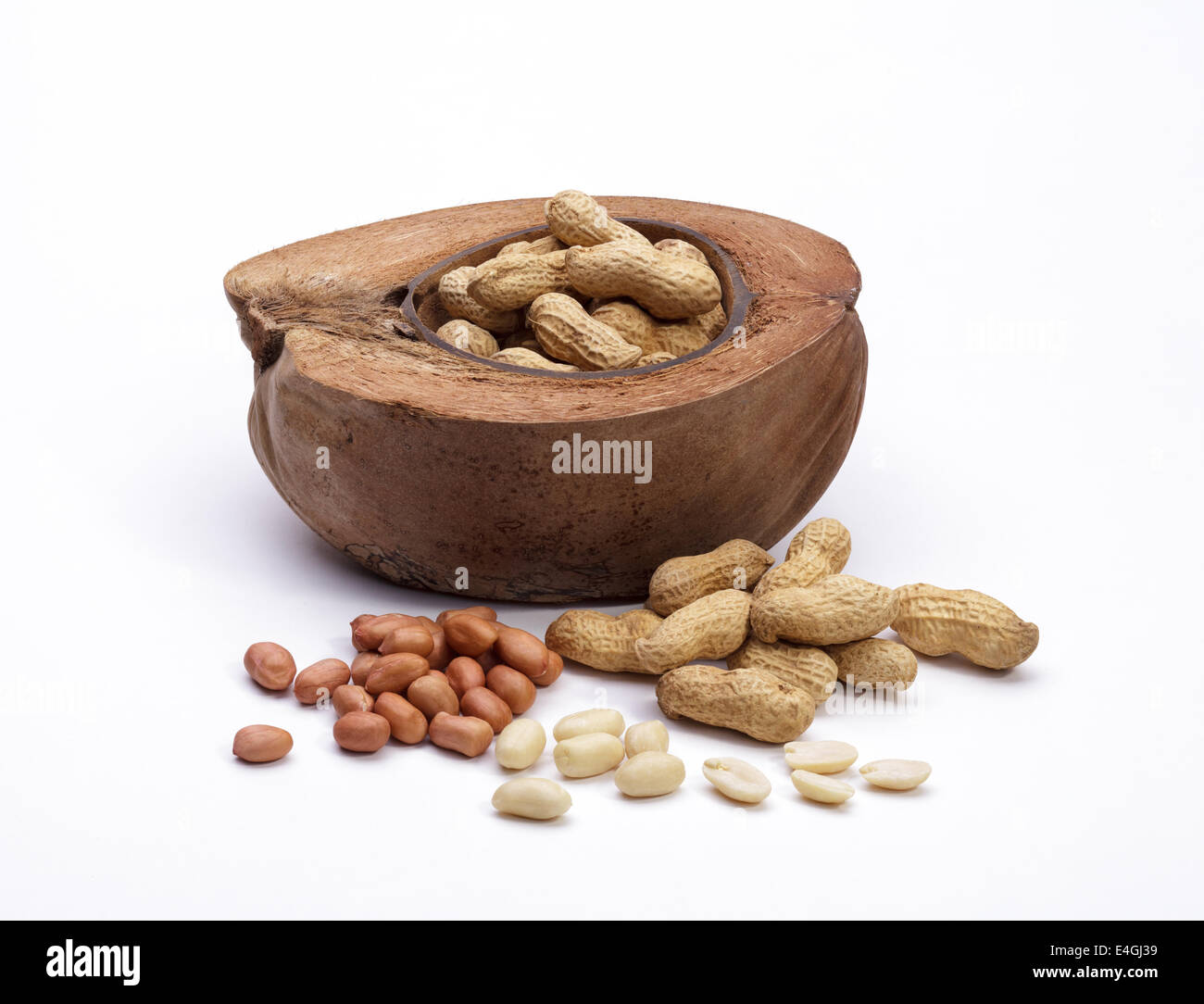 Peanuts in the coconut bowl isolated on white background Stock Photo ...