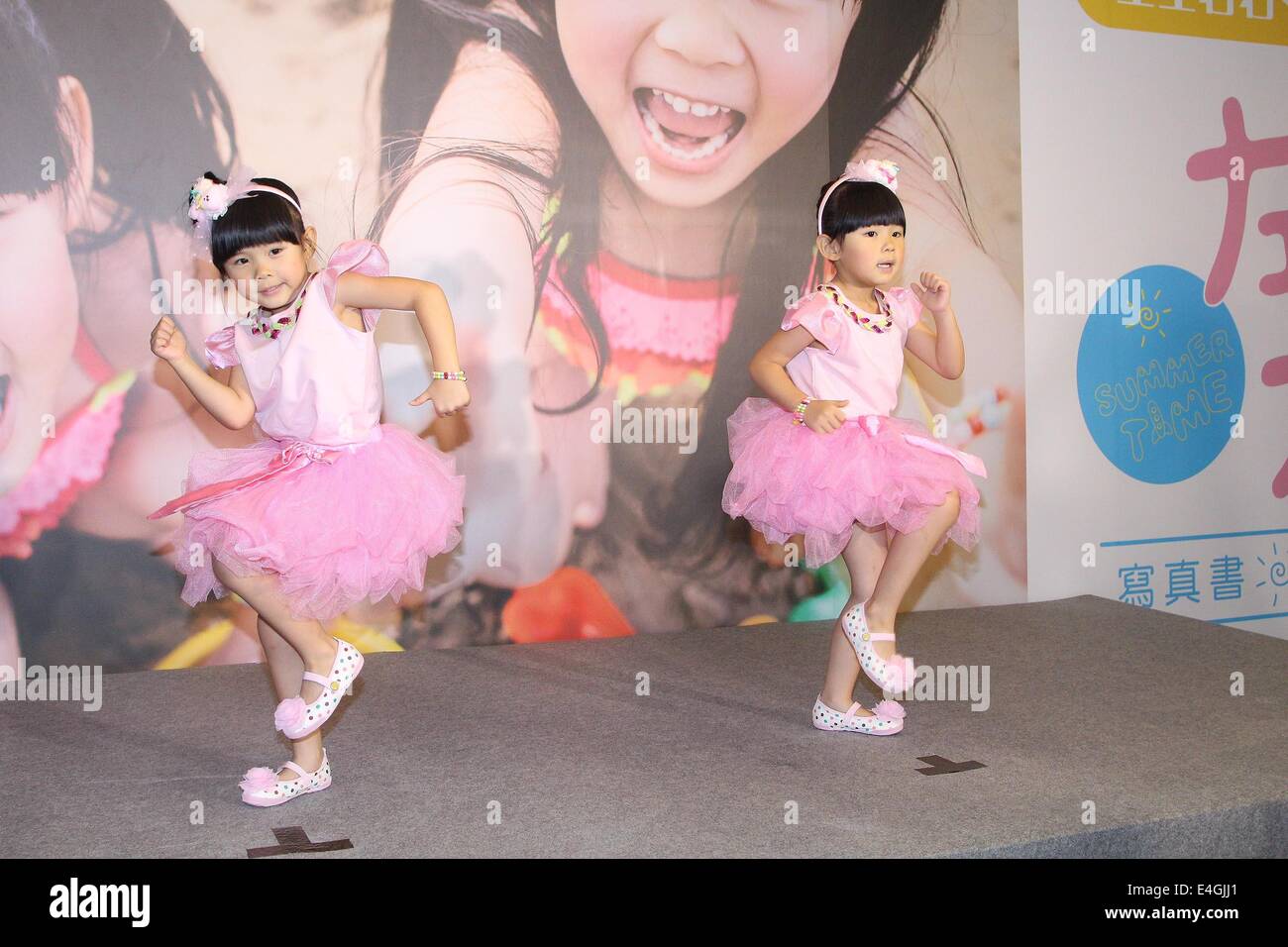 Taipei. 10th July, 2014. Twin sisters Yony&Zony release photo album in ...