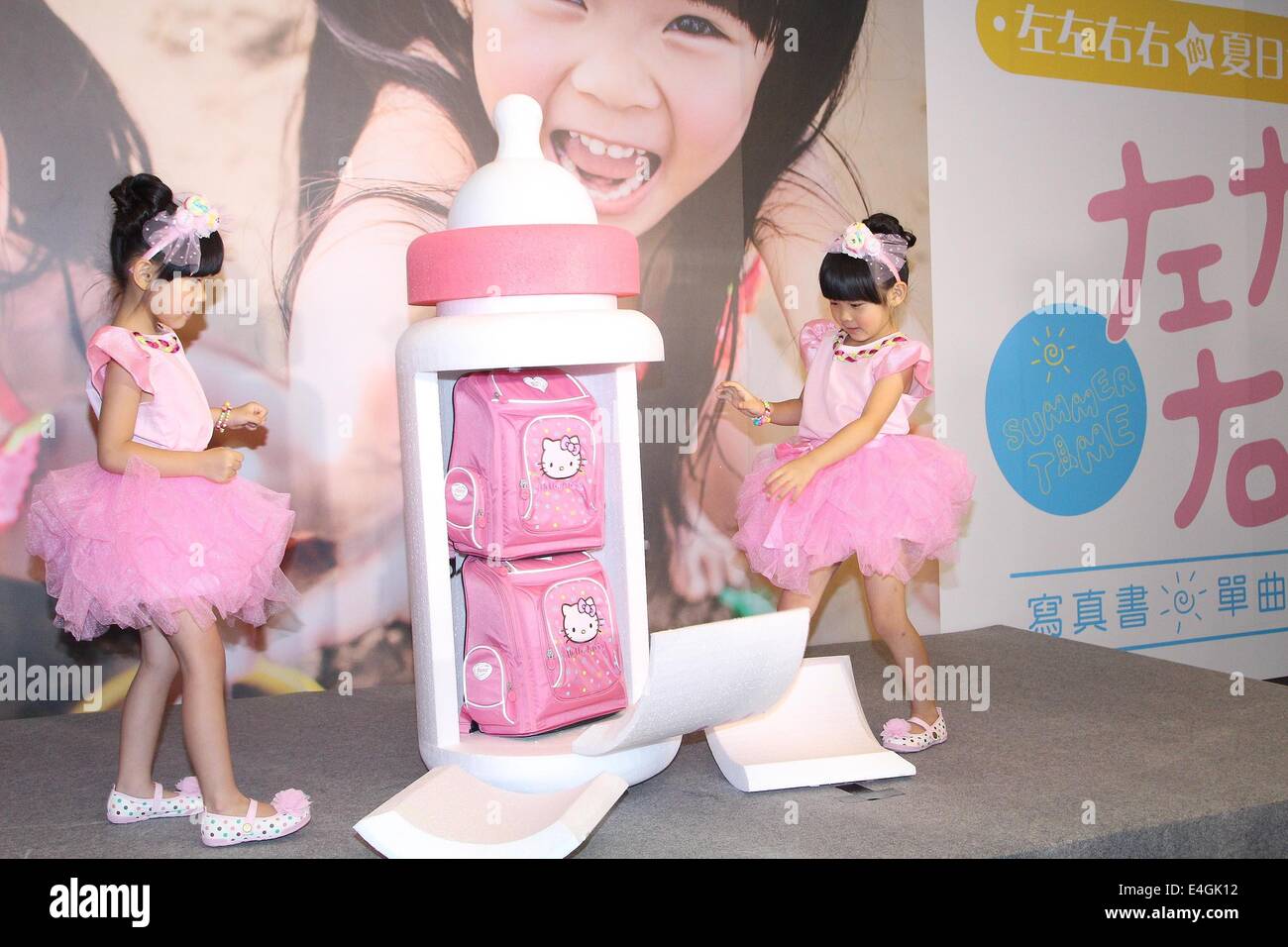 Taipei. 10th July, 2014. Twin sisters Yony&Zony release photo album in ...
