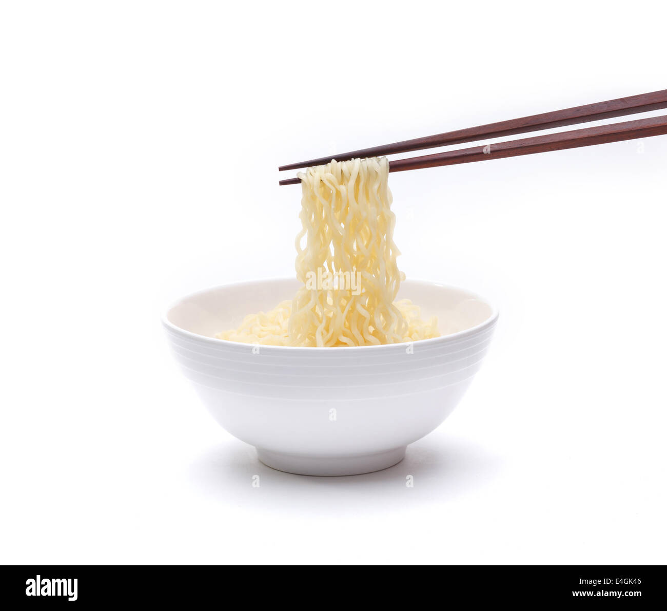 Ready made instant noodle in a bowl with chopstick isolated on white ...