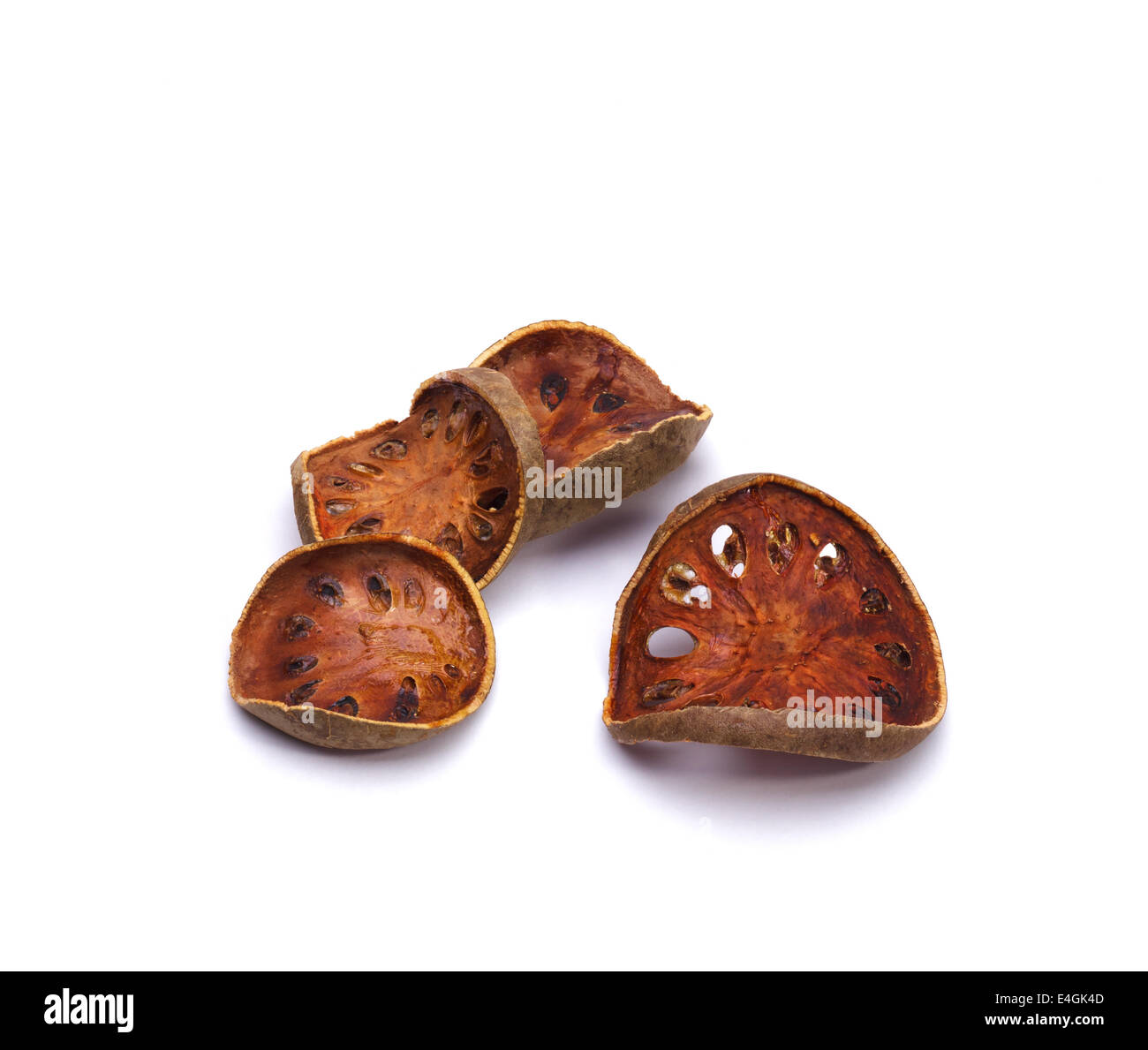 Slices of dried bael fruit isolated on white background Stock Photo - Alamy