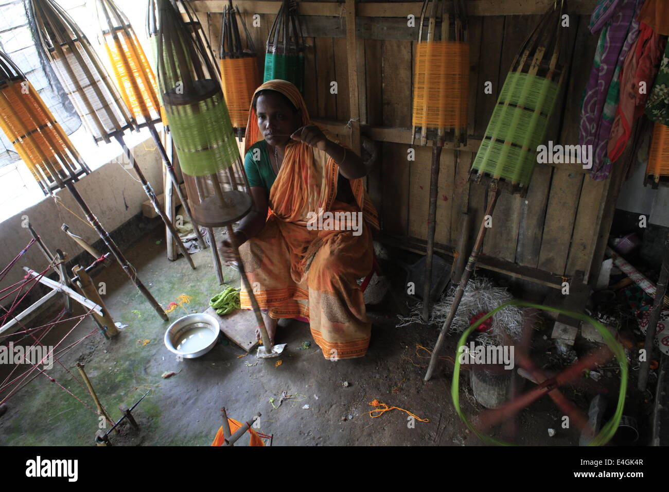 weaving fabrics for making jamdani sharee.A sharee is the traditional ...