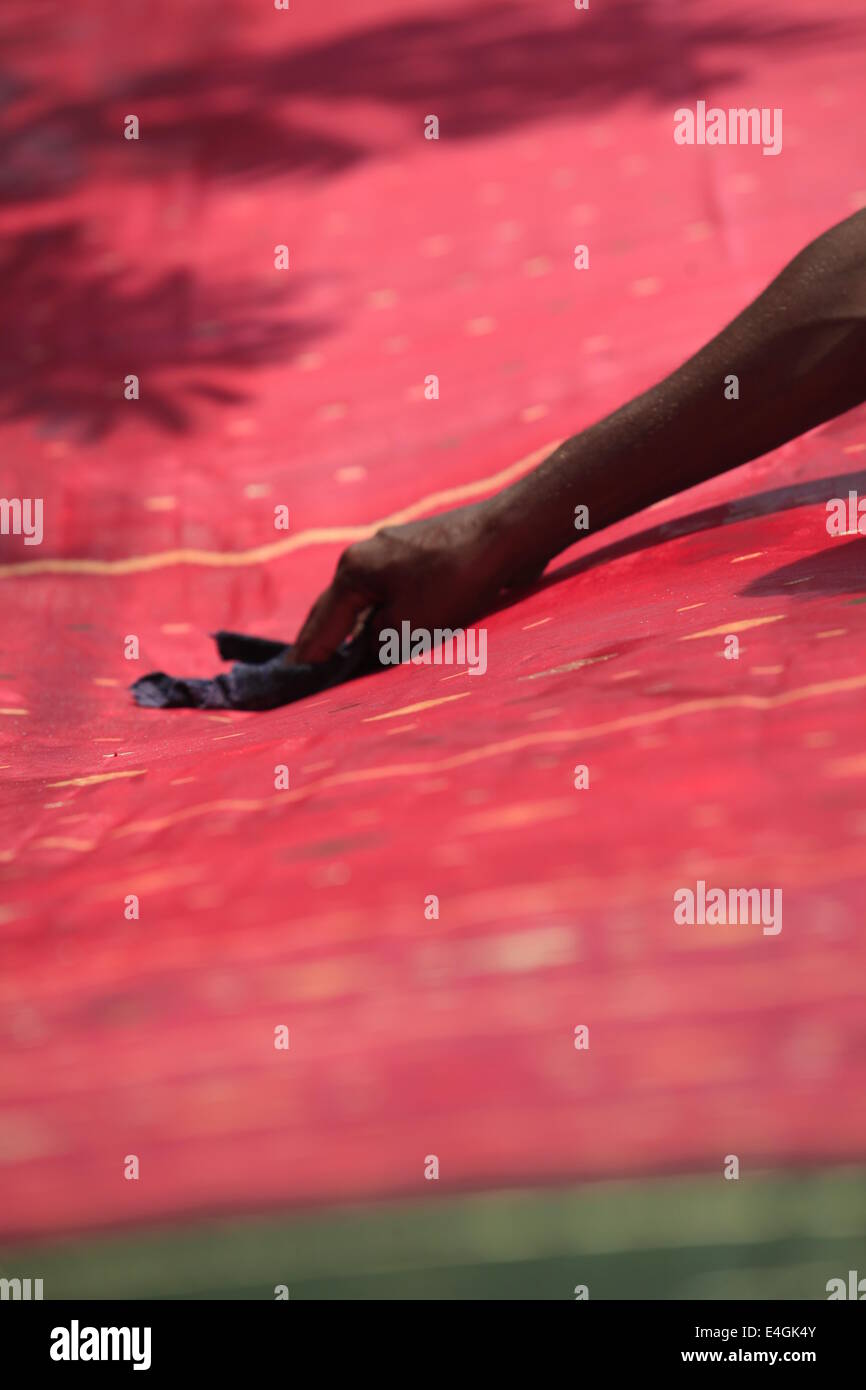 coloring febrics for making jamdani sharee. A sharee is the traditional ...