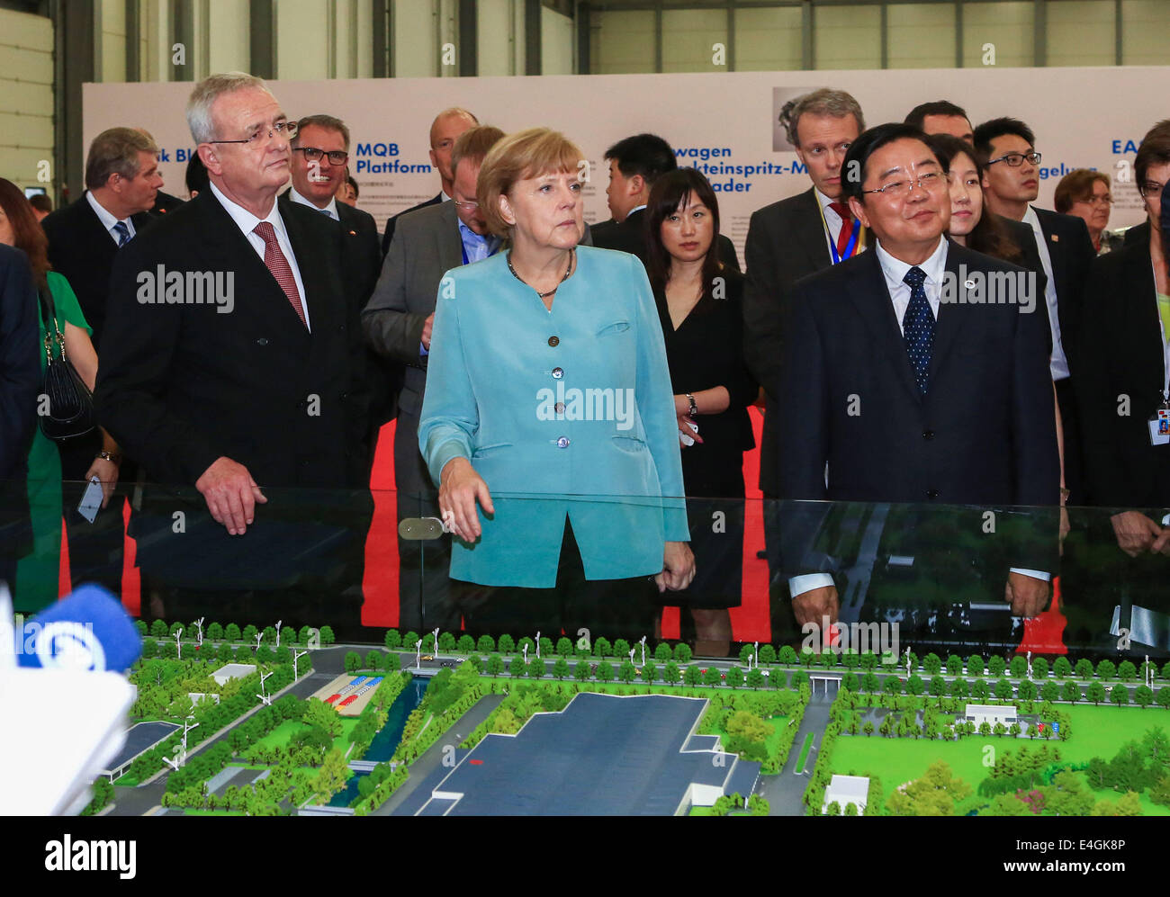 HANDOUT - German Chancellor Angela Merkel, Volkswagen CEO Martin ...