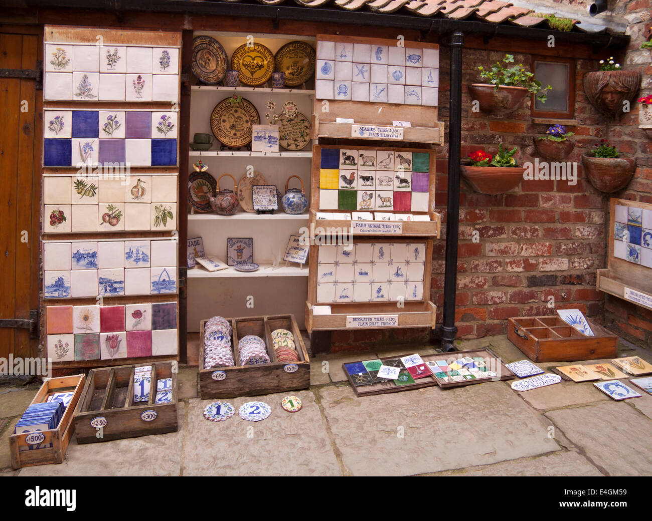 Hand-made pottery display outside the studio of the Washhouse Pottery ...
