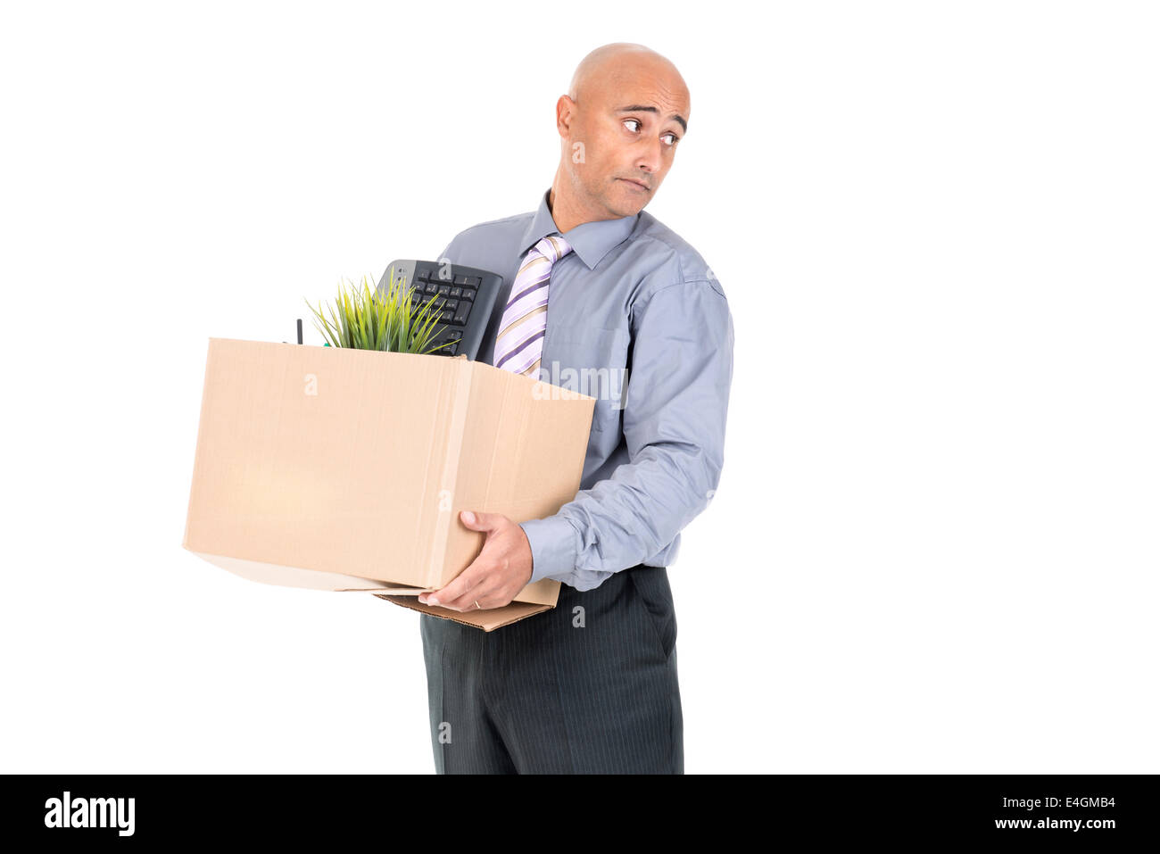 Fired worker with cardboard box with his belongings Stock Photo - Alamy
