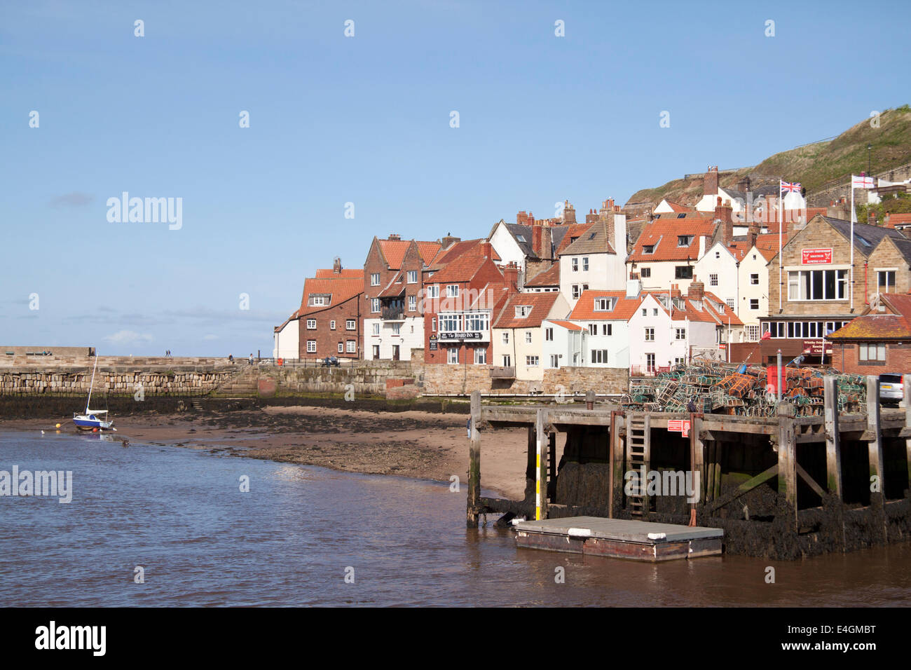 View of Whitby harbour and sea wall Stock Photo - Alamy