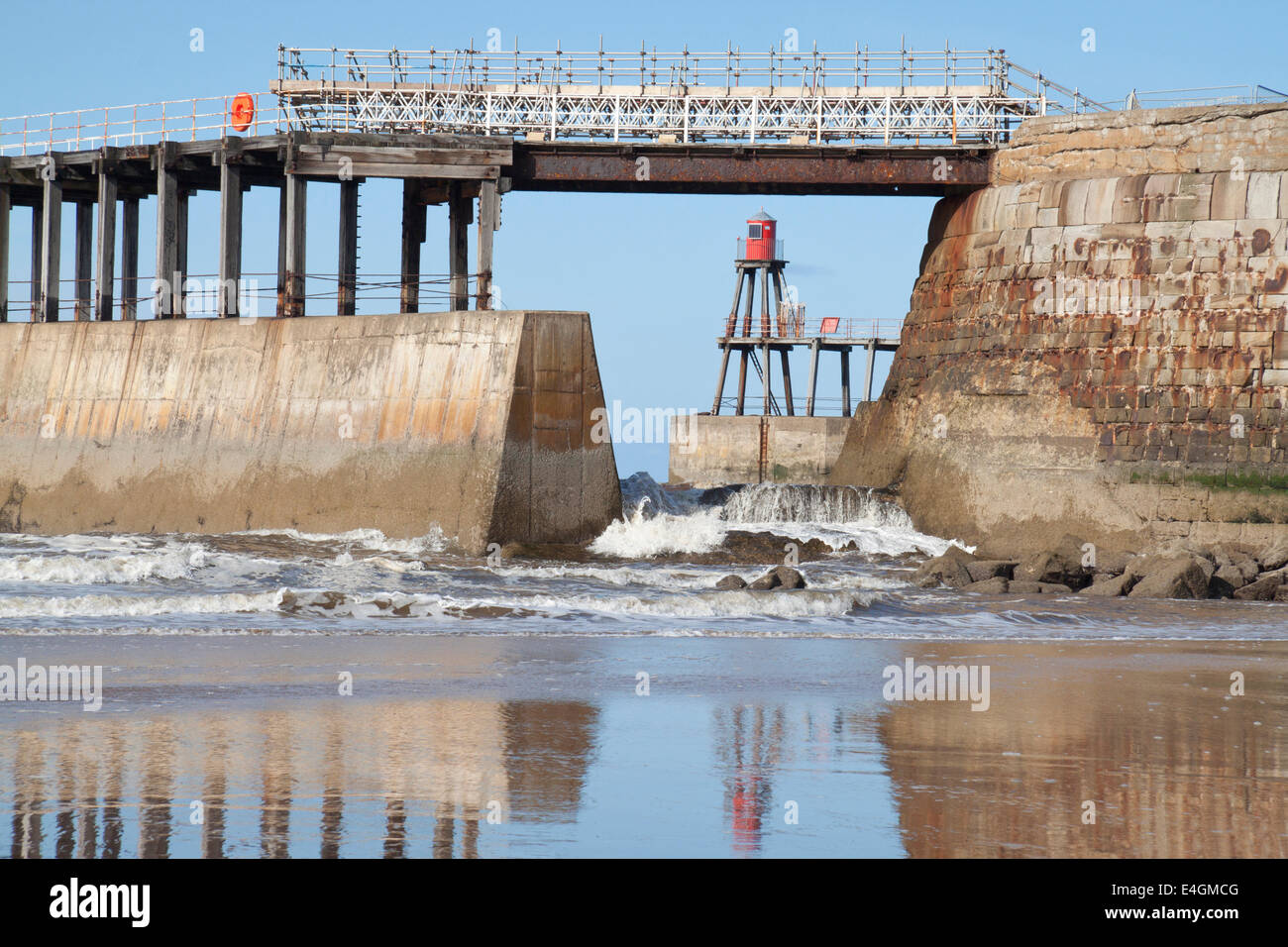 View of the sea at Whitby showing the harbour wall Stock Photo - Alamy