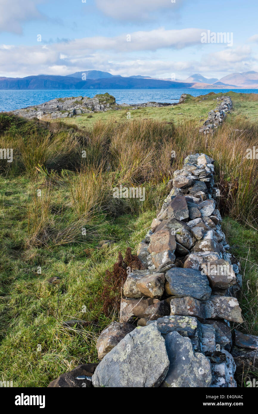 Stone wall and view to Mull Stock Photo - Alamy
