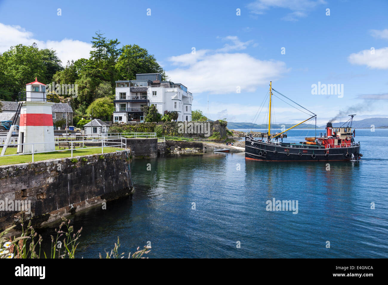 VIC 32 steam puffer approaches Crinan Sea Lock Stock Photo - Alamy