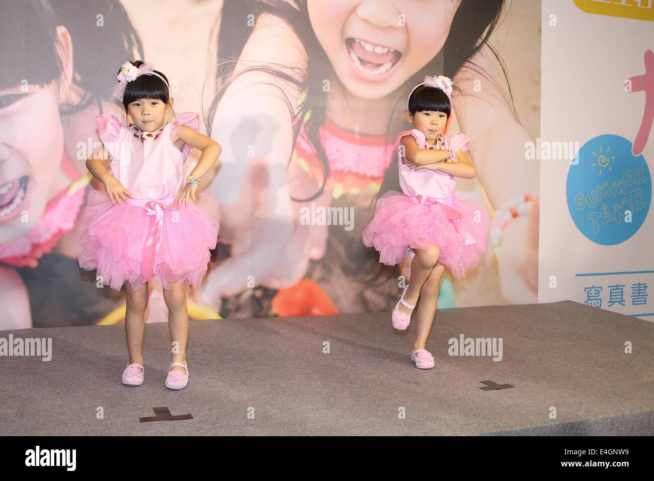 Taipei. 10th July, 2014. Twin sisters Yony&Zony release photo album in ...