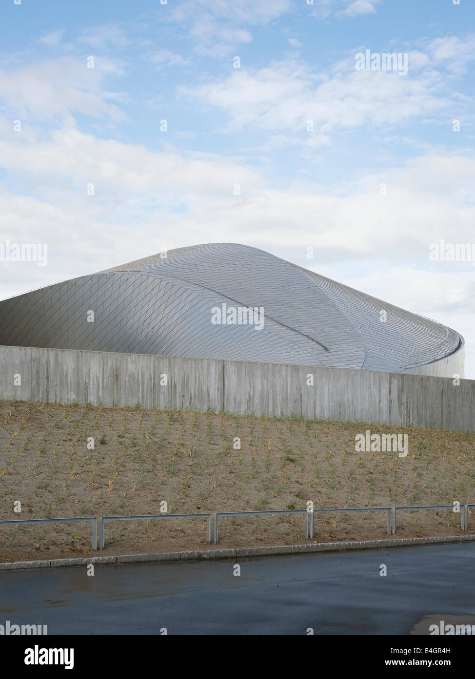 Curved roof with small diamond shaped aluminium shingles of Den Blå ...
