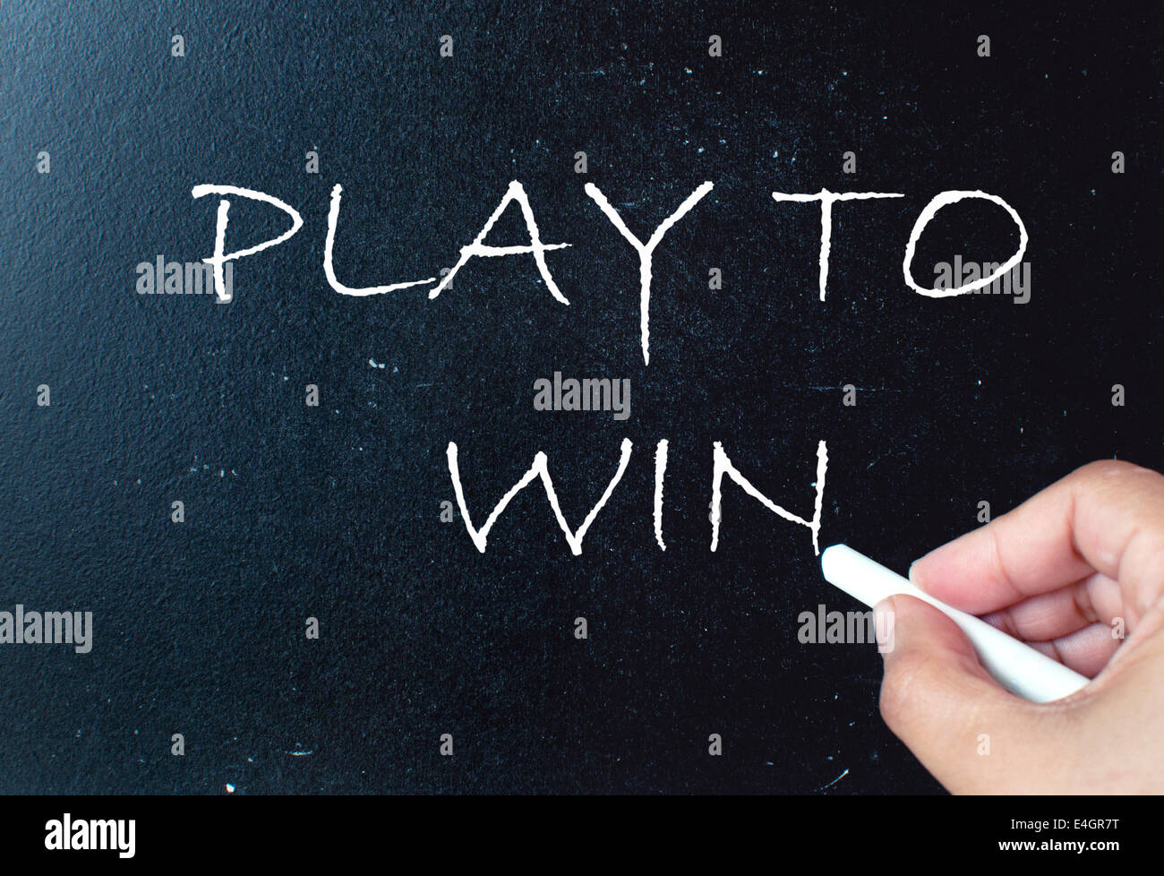 Play to win success concept Stock Photo - Alamy