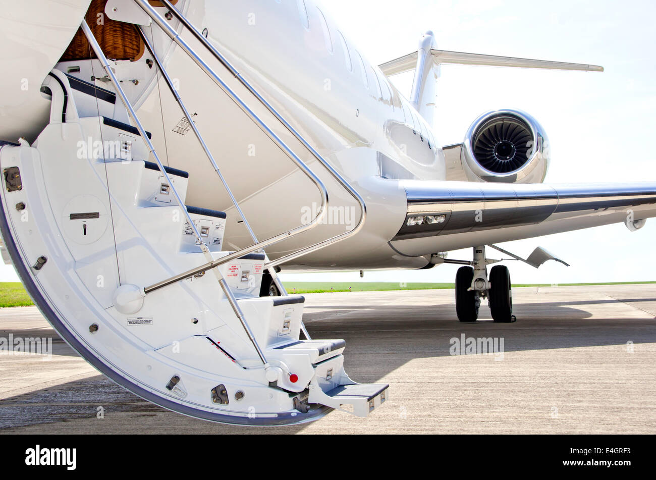Stairs with Jet Engine on a modern private jet airplane - Bombardier ...