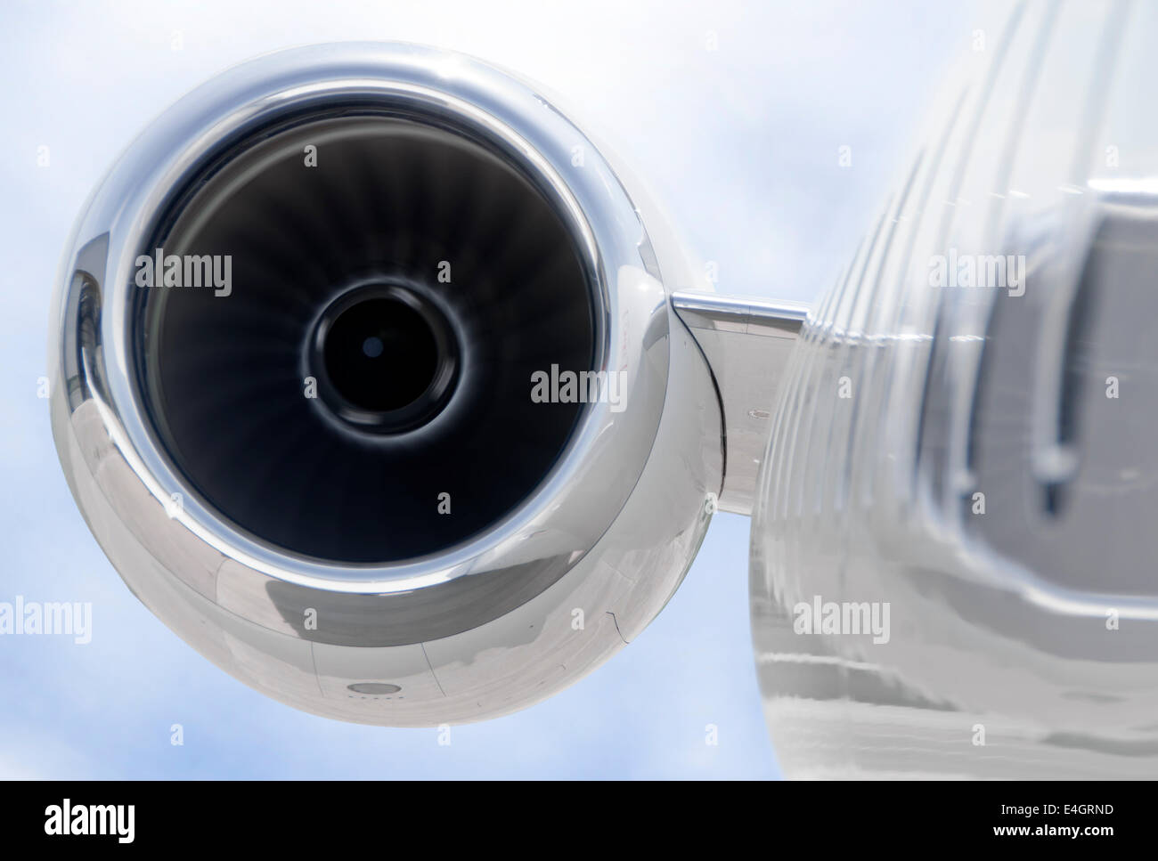 Running Jet Engine closeup on a modern private jet airplane ...