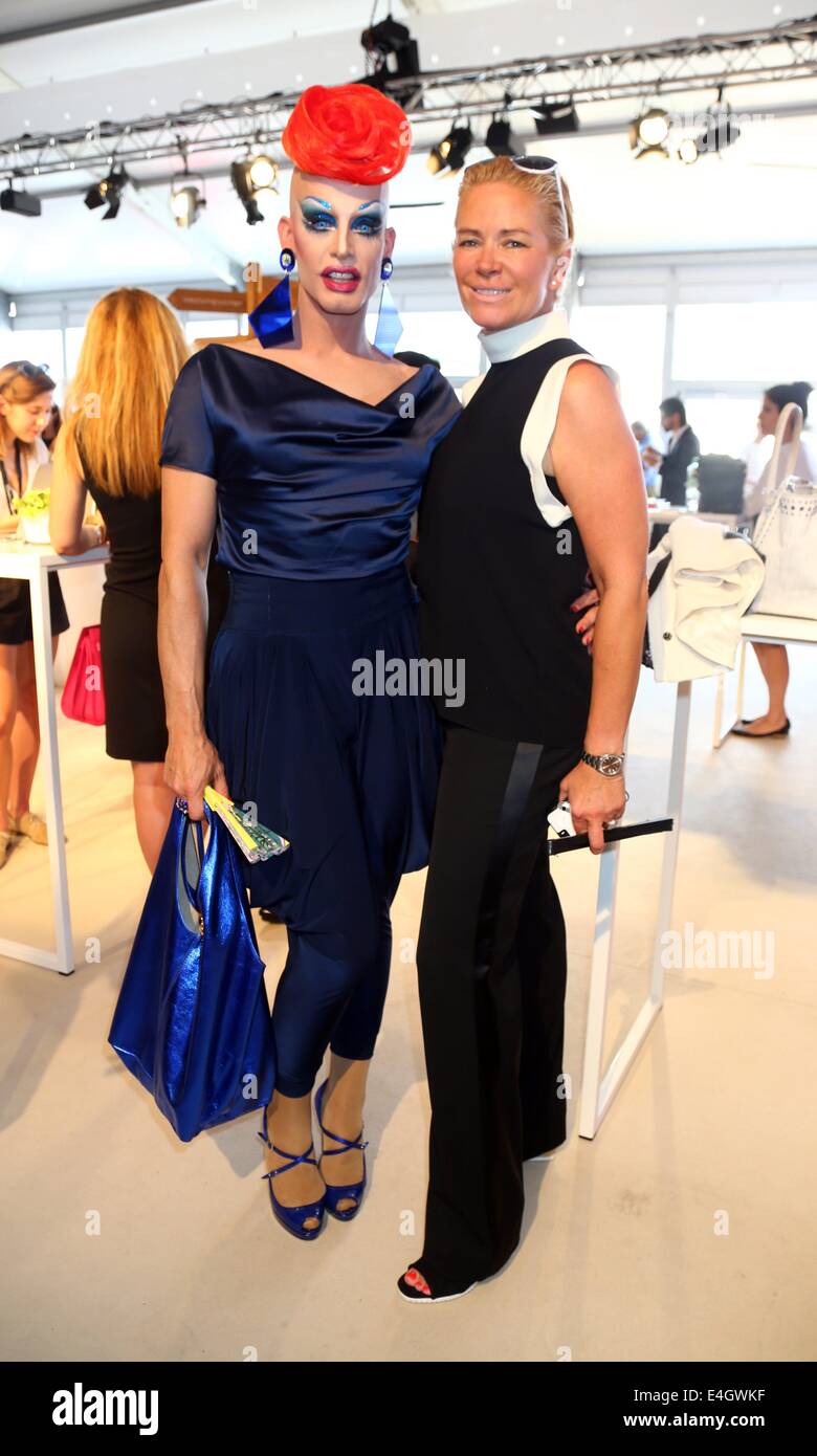 Berlin. 10th July, 2014. Ruda Puda and Claudia Effenberg, right, pose ...