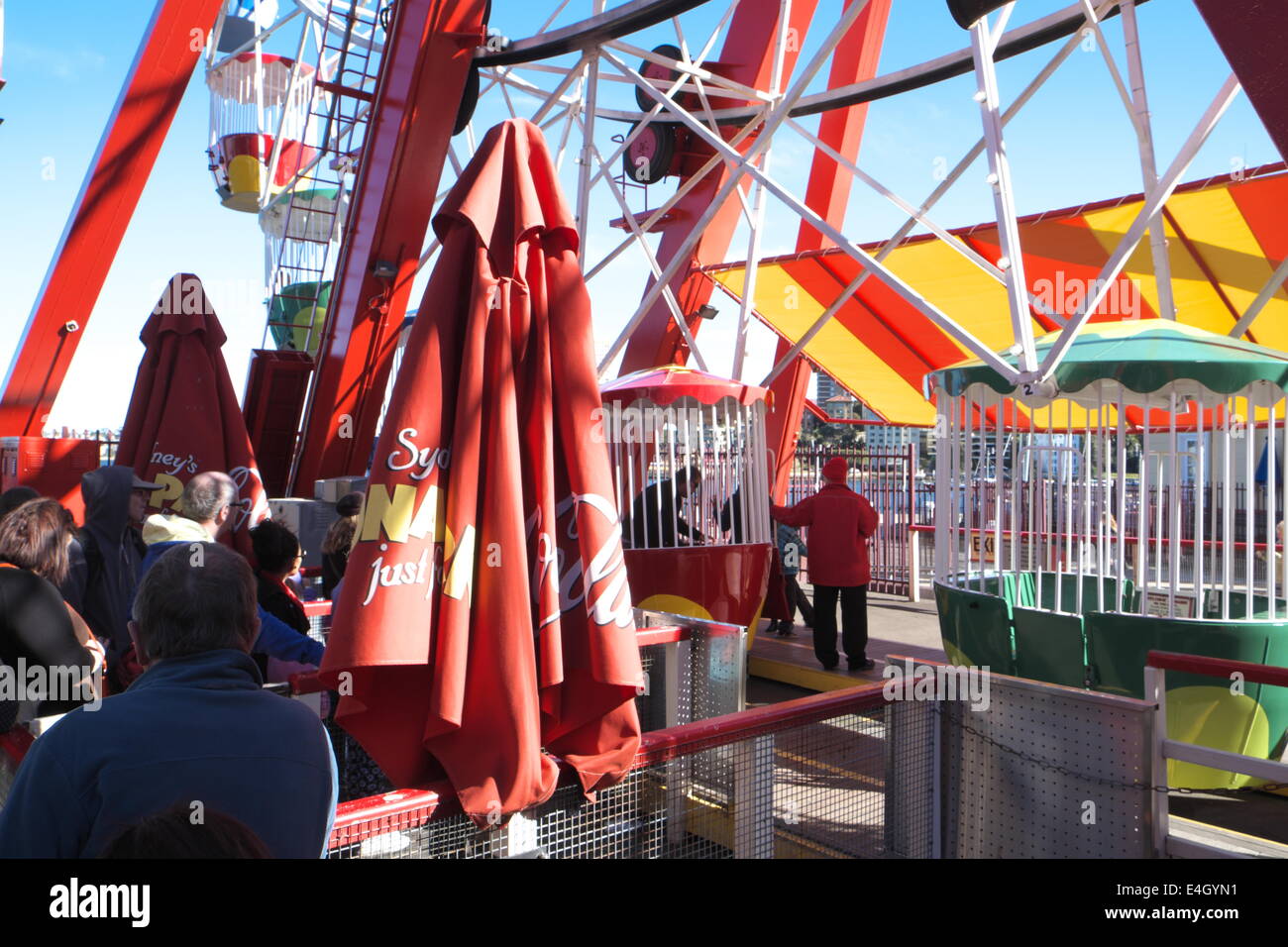 queue of people for the ferris wheel at luna park,milsons point,sydney ...