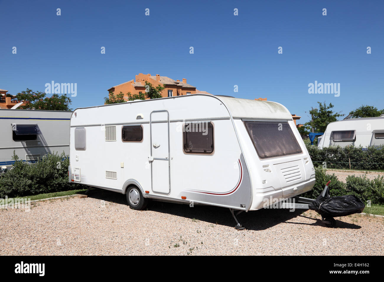 Caravan on a camping site in Spain Stock Photo - Alamy