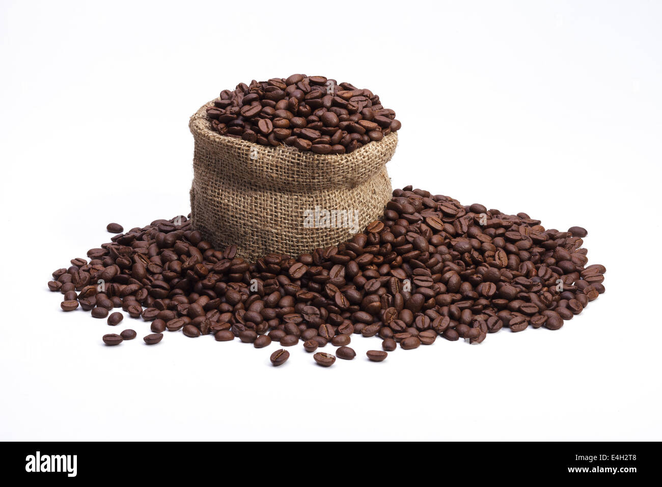 Coffee seeds in bag sack isolated on white background Stock Photo - Alamy