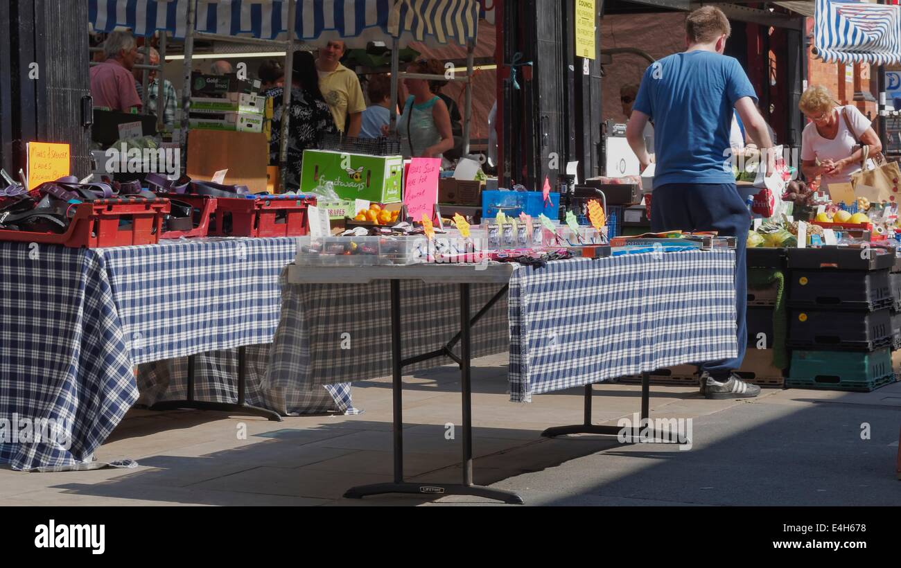 Stalls in the sunny side of the covered Victorian Market spreading onto ...