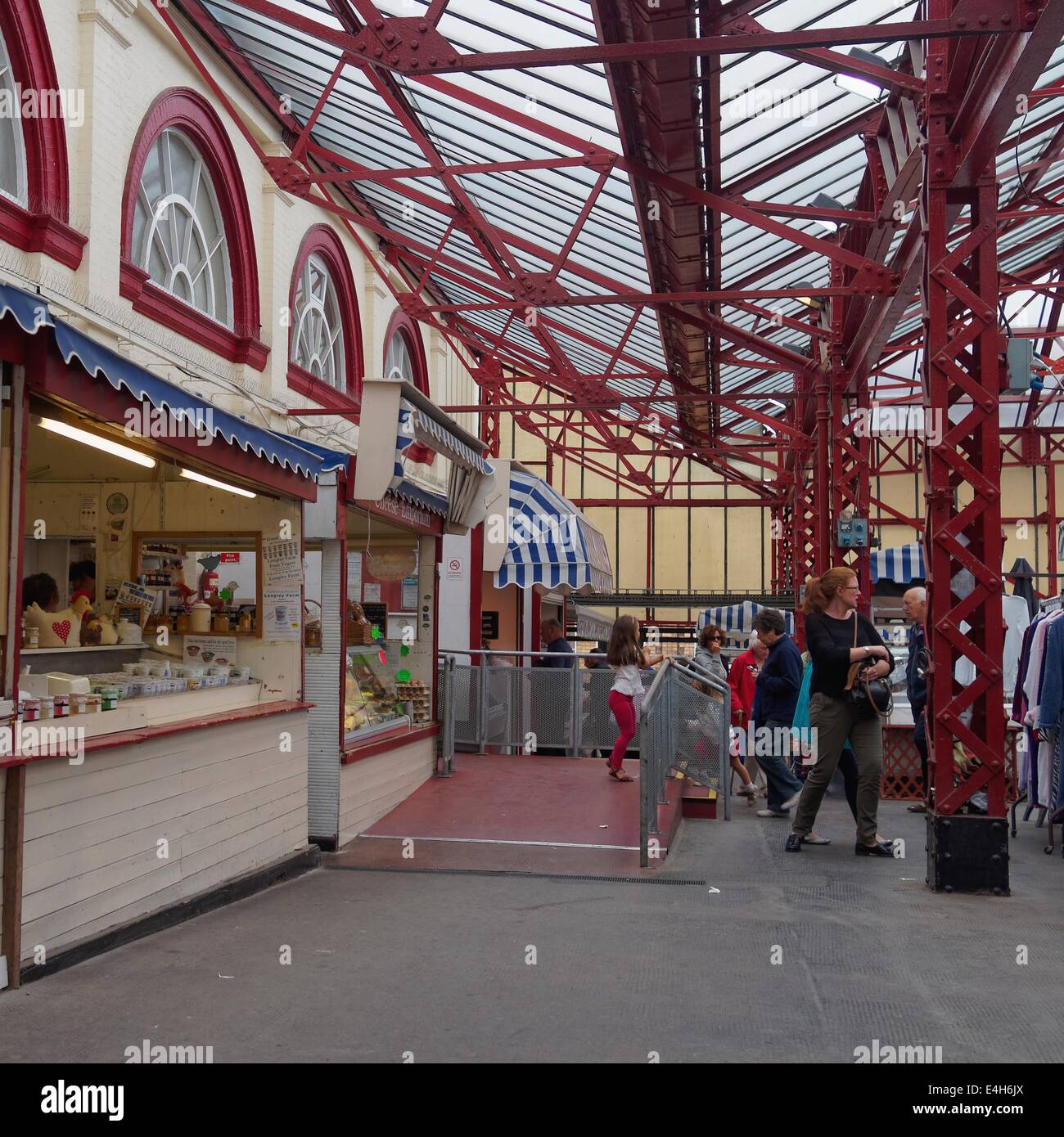 A row of permanent stalls along one side of the Victorian Altrincham ...