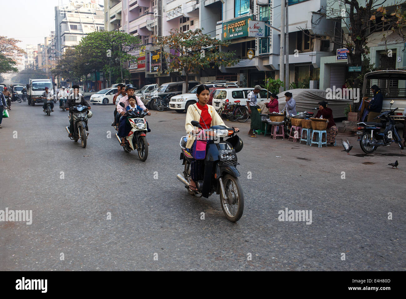 Morning road traffic in central Mandalay, Myanmar (Burma Stock Photo ...