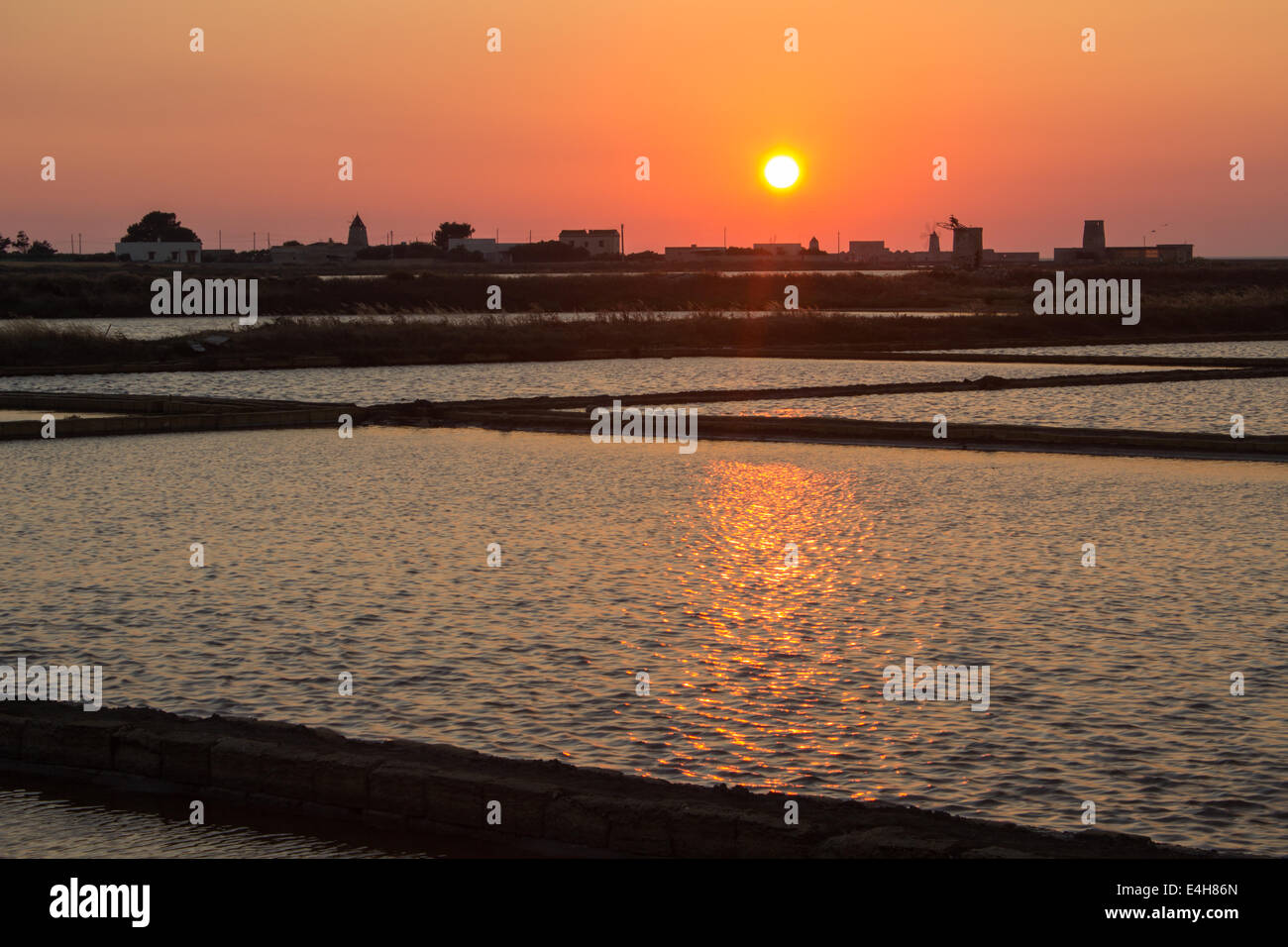 sunset sun salt-marsh water dusk orange evening landscape nobody ...