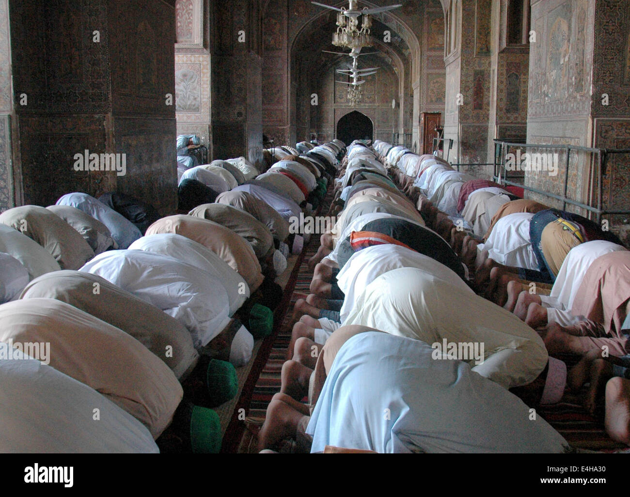 Lahore. 11th July, 2014. Pakistani Muslims offer special Friday prayer ...