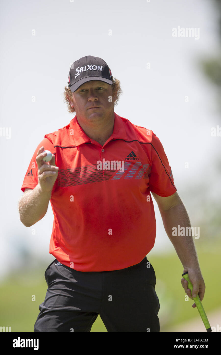Silvis, Iowa, USA. 11th July, 2014. William McGirt, acknowledges the ...