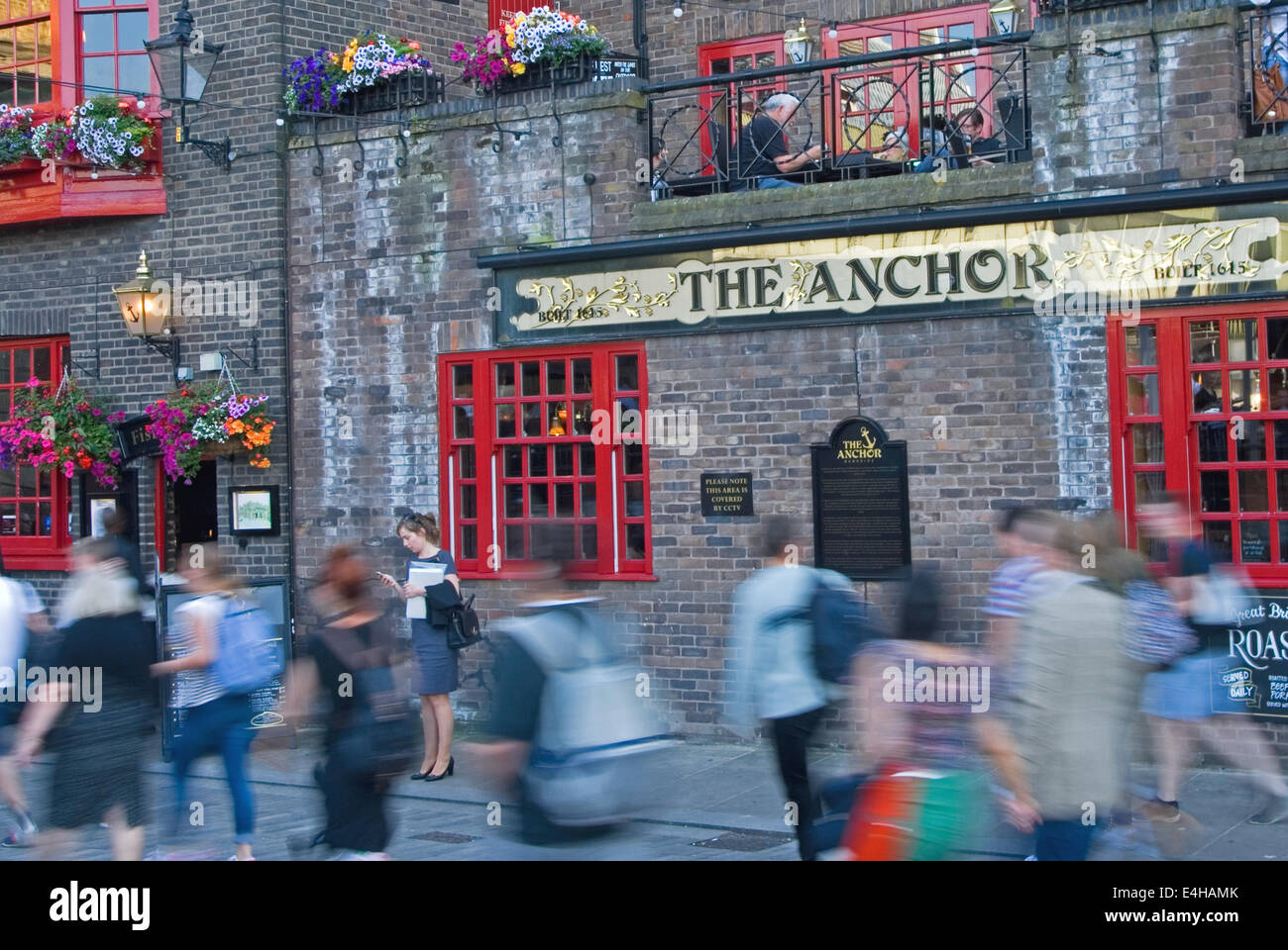 Woman waiting outside pub hi-res stock photography and images - Alamy