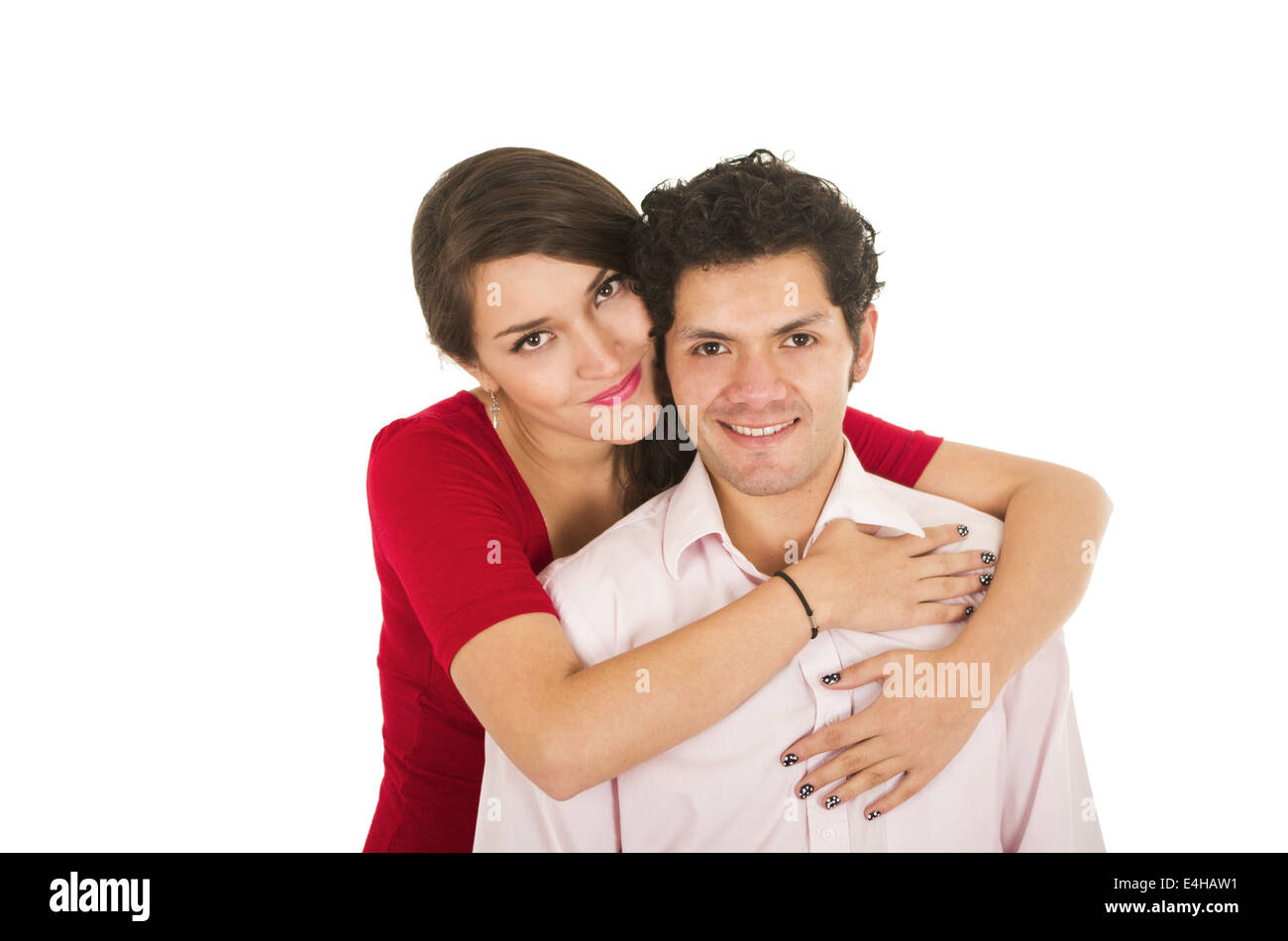 hispanic young couple hugging Stock Photo - Alamy