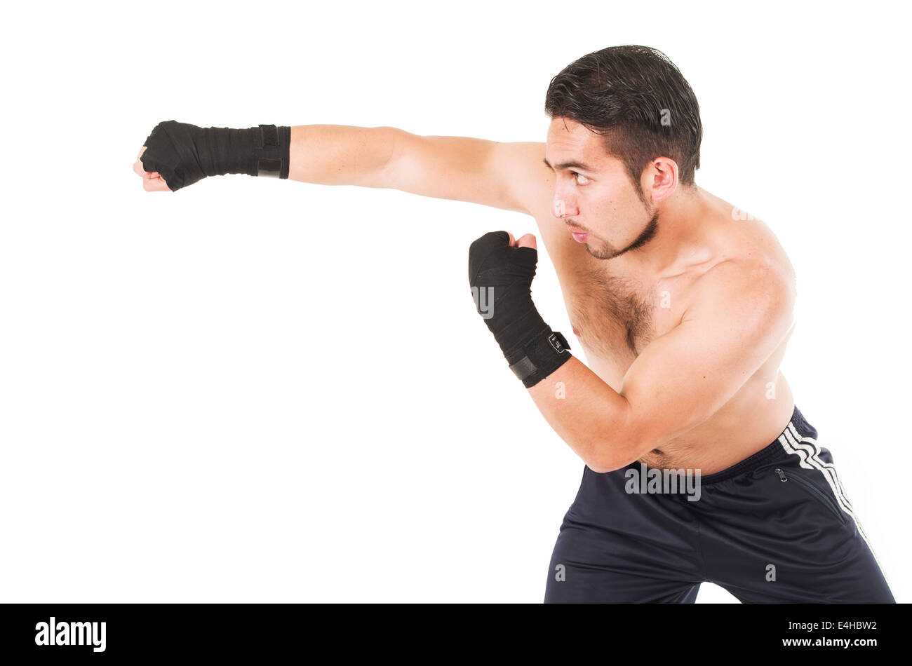 muscular martial arts fighter attacking Stock Photo - Alamy