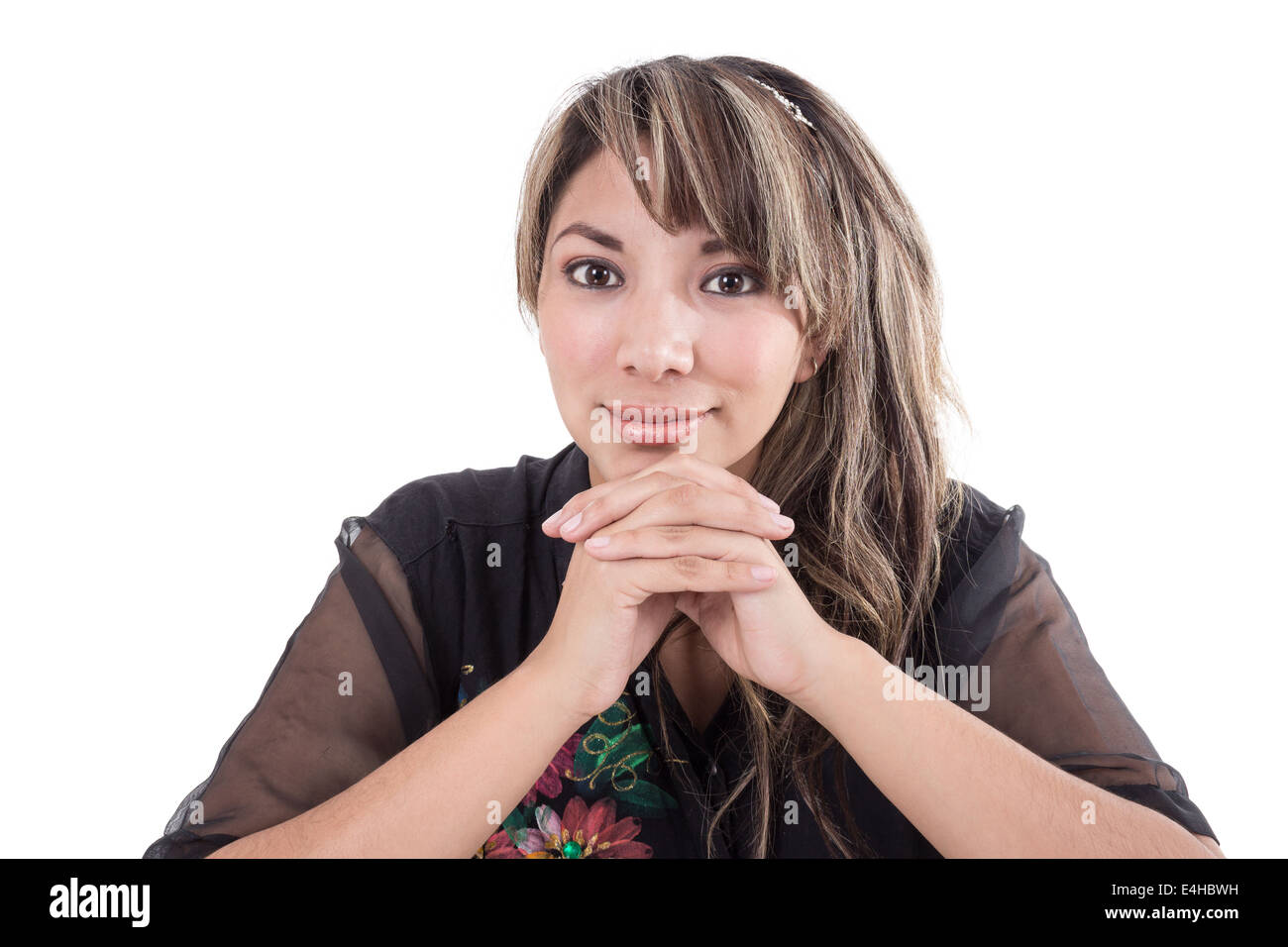 beautiful girl posing with hand under her chin Stock Photo - Alamy